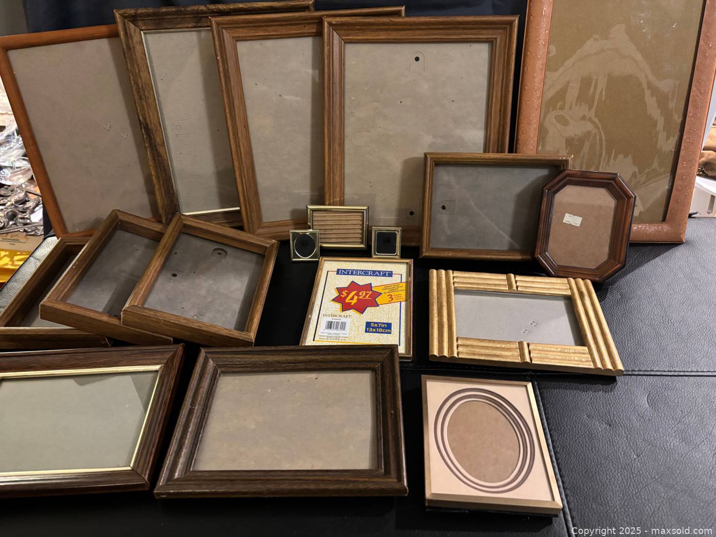Assorted metal, wood and vinyl picture frames | Maxsold