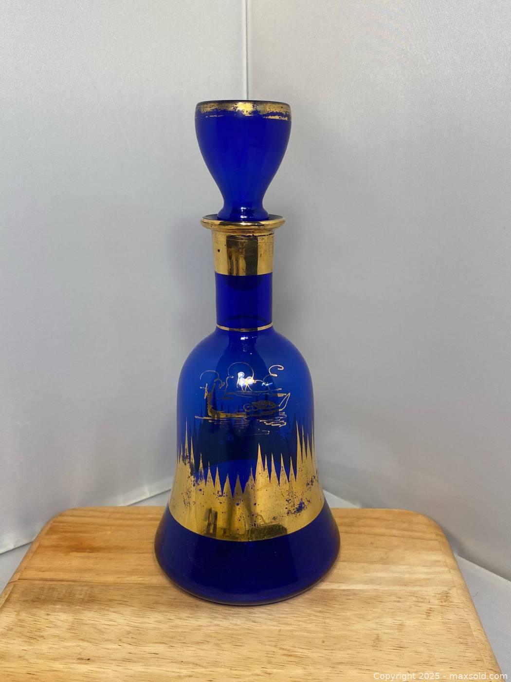 Rossini cobalt blue decanter with four glasses | Maxsold