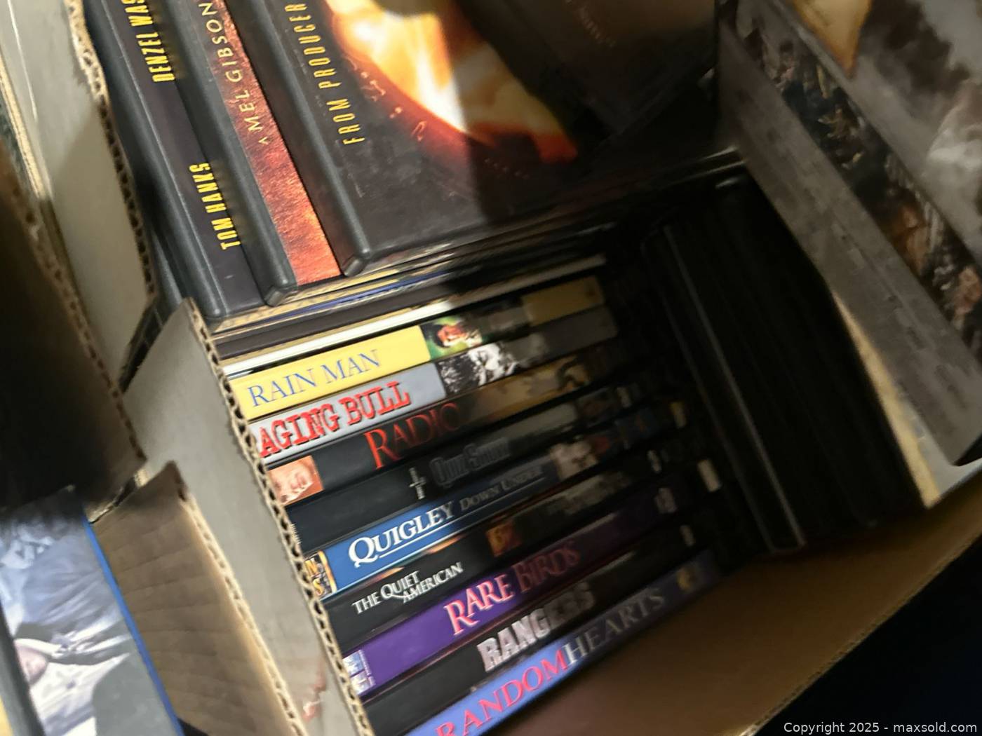 13 boxes of DVDs | Maxsold