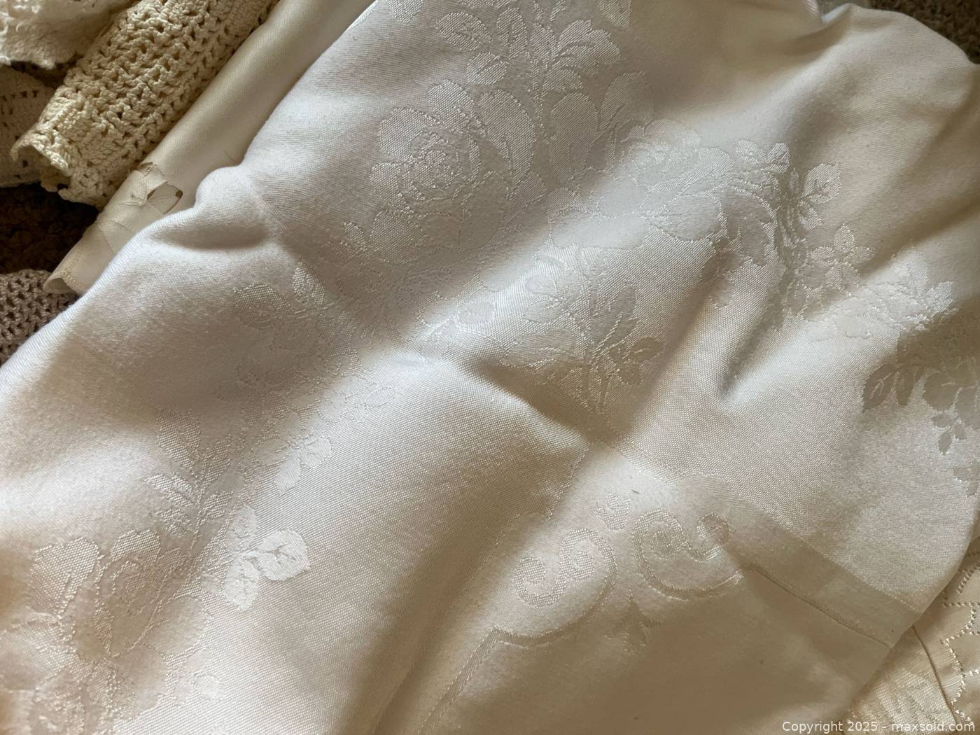 Vintage mixed lace and damask table linens | Maxsold