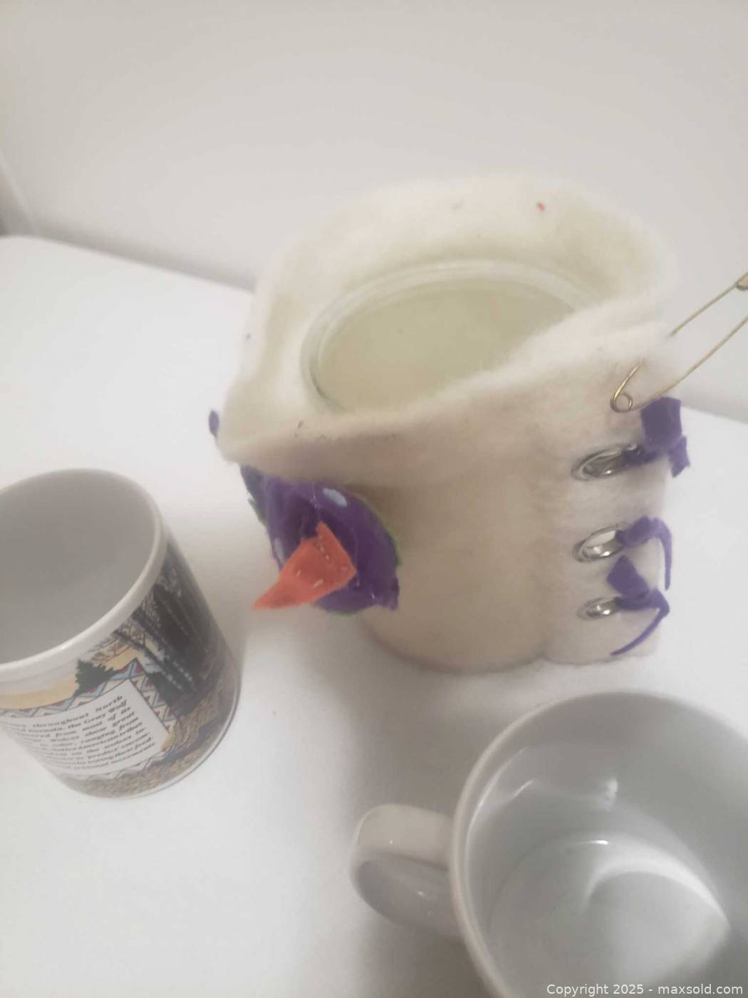 Indigenous design mugs with handmade felt mug cozy | Maxsold