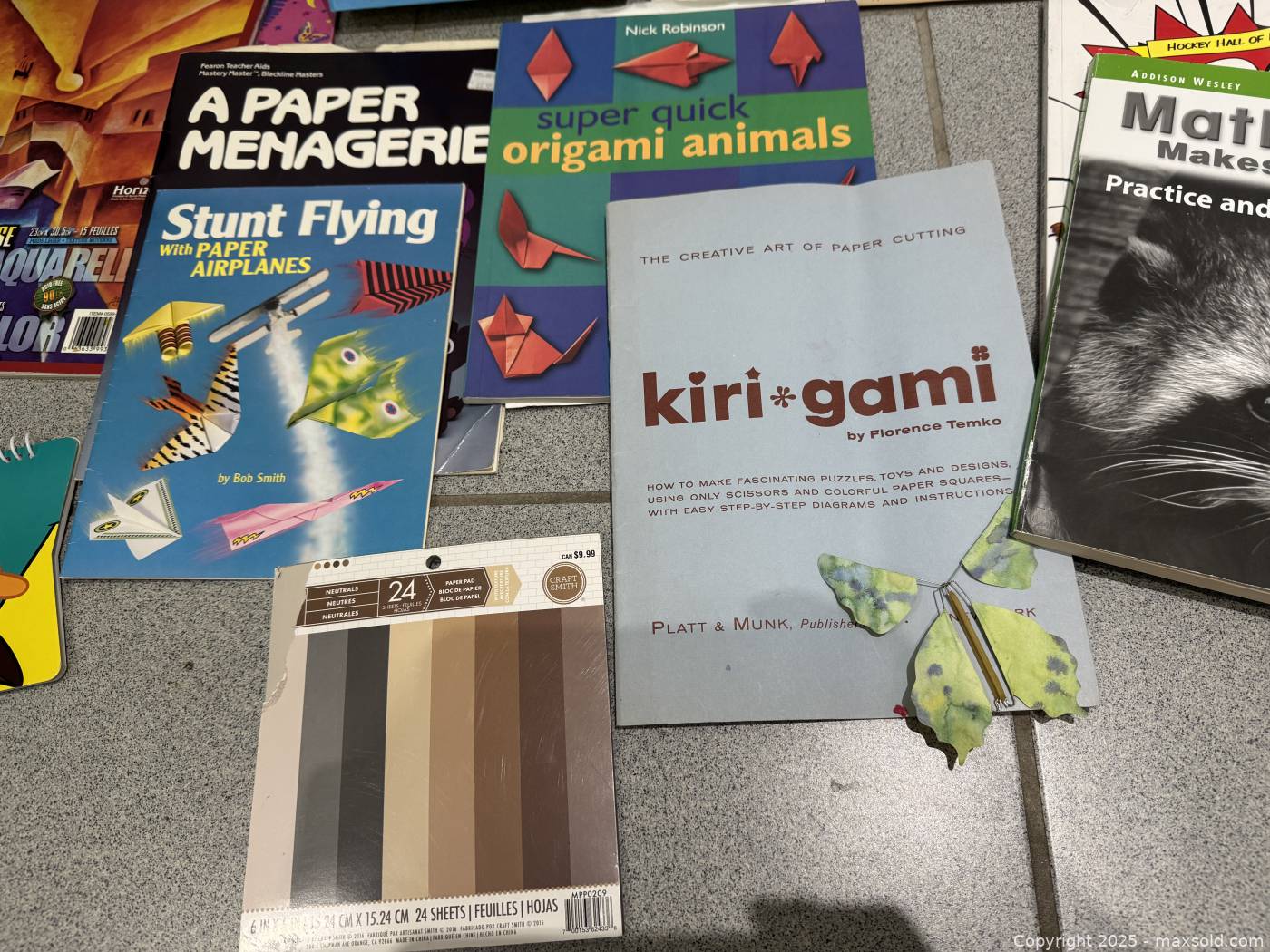 Origami, kirigami, paper airplane and math books with cardstock | Maxsold