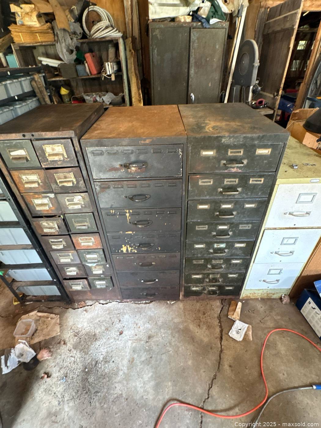 Four metal multi-drawer filing cabinets | Maxsold