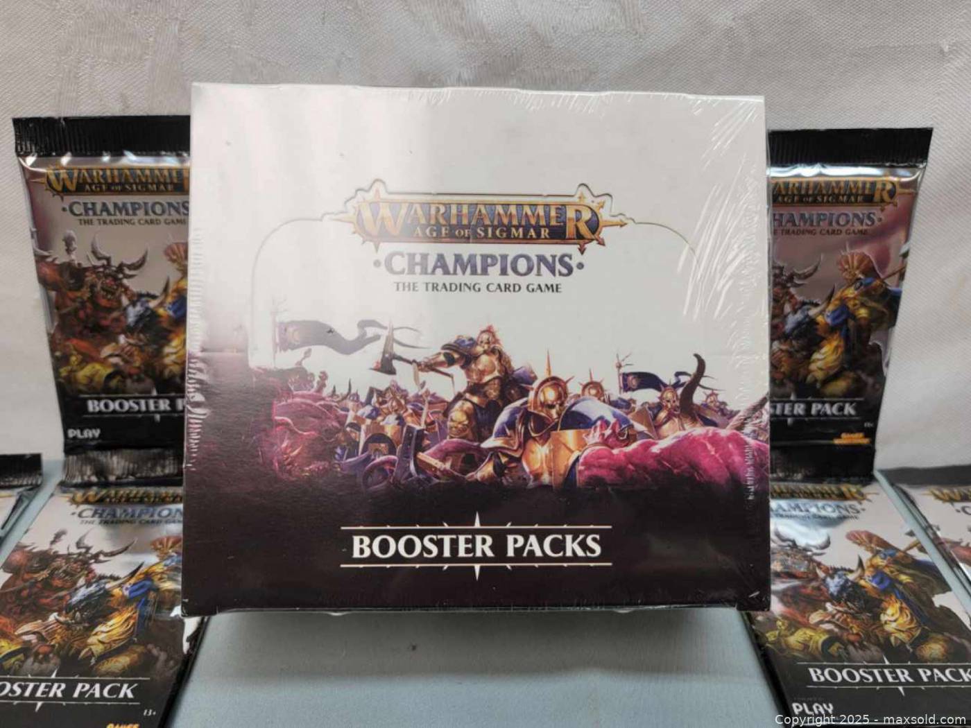 3 Warhammer Age Of Sigmar Champions sealed booster boxes | Maxsold