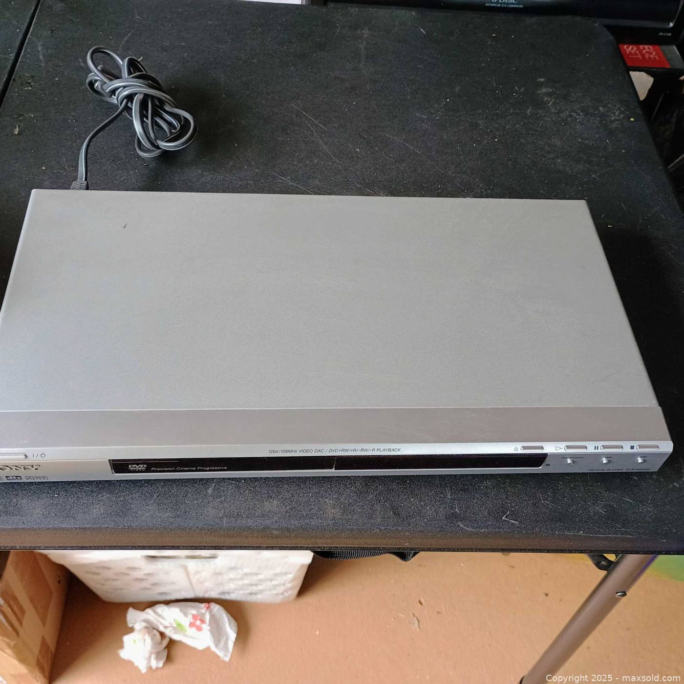 Sony silver DVD player with power cord | Maxsold