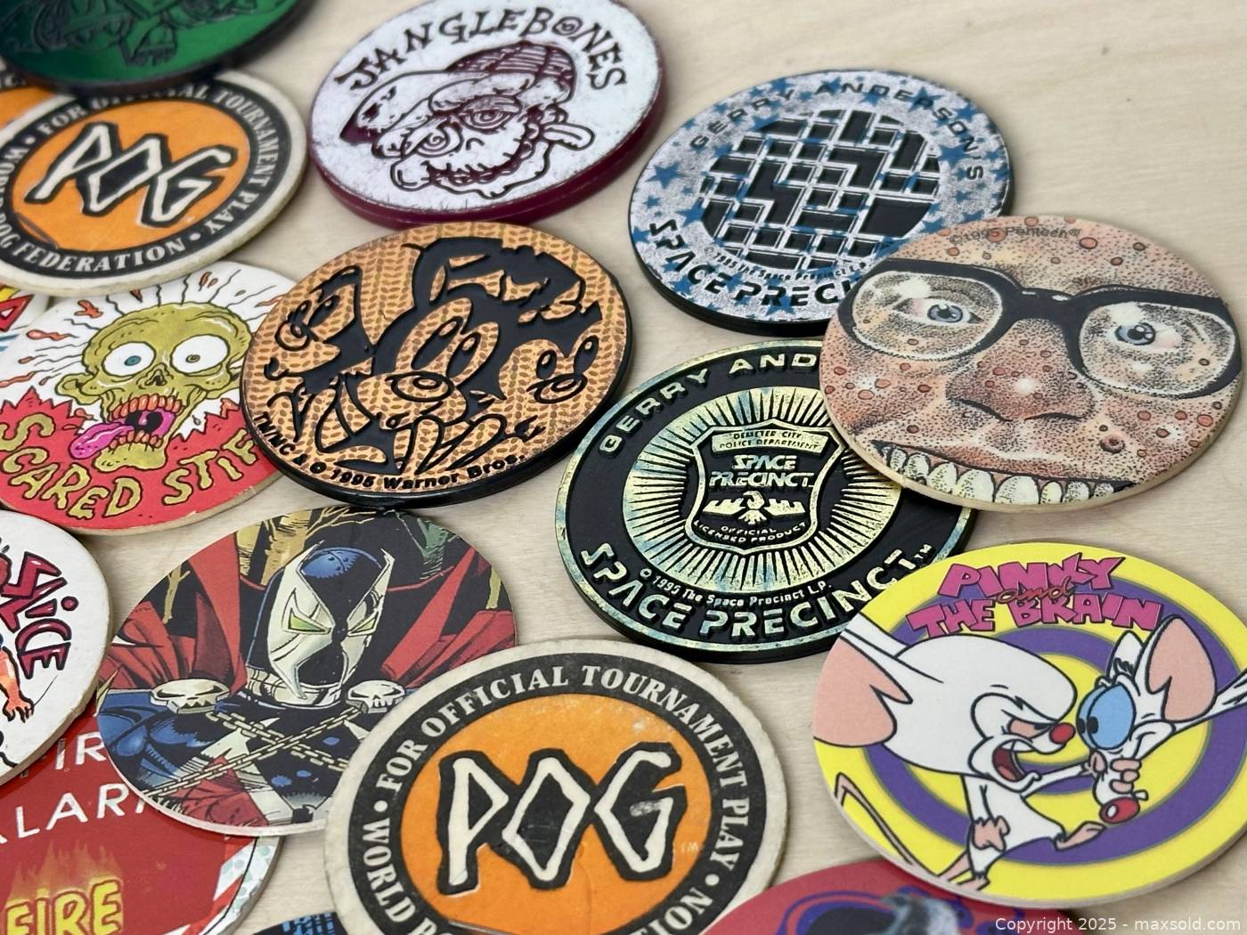 1990s POG cardboard milk caps, slammers, case | Maxsold