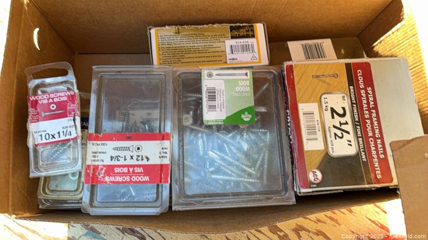 Assorted wood screws and nails in two boxes | Maxsold