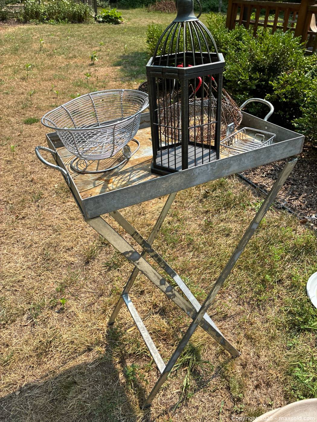 Metal tray table, birdcage, colander set | Maxsold