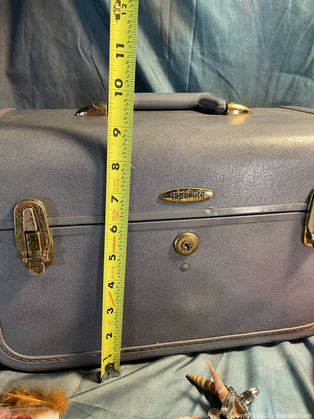 Taperlite light blue train case with mixed craft supplies | Maxsold