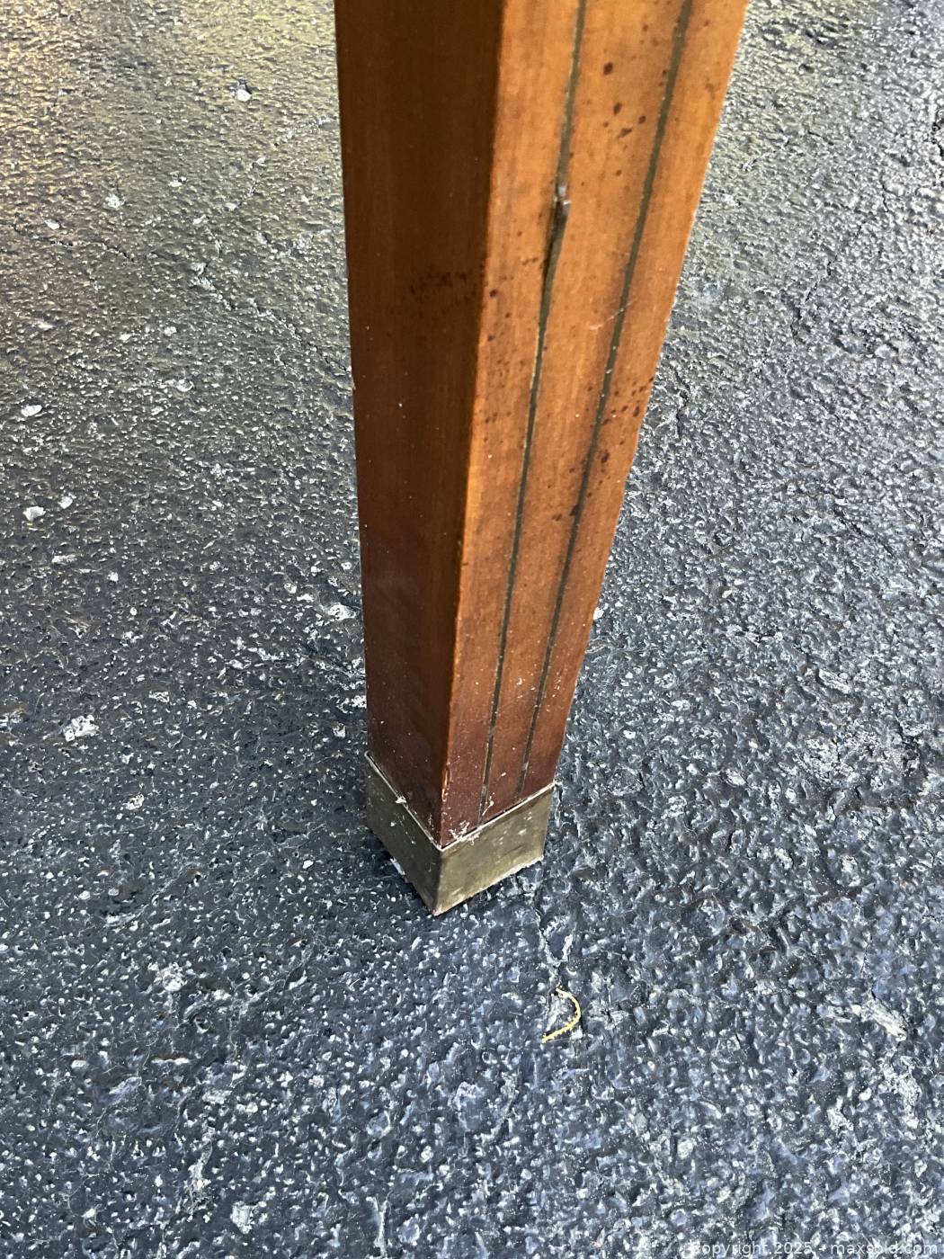 Oval mahogany table with brass capped feet | Maxsold