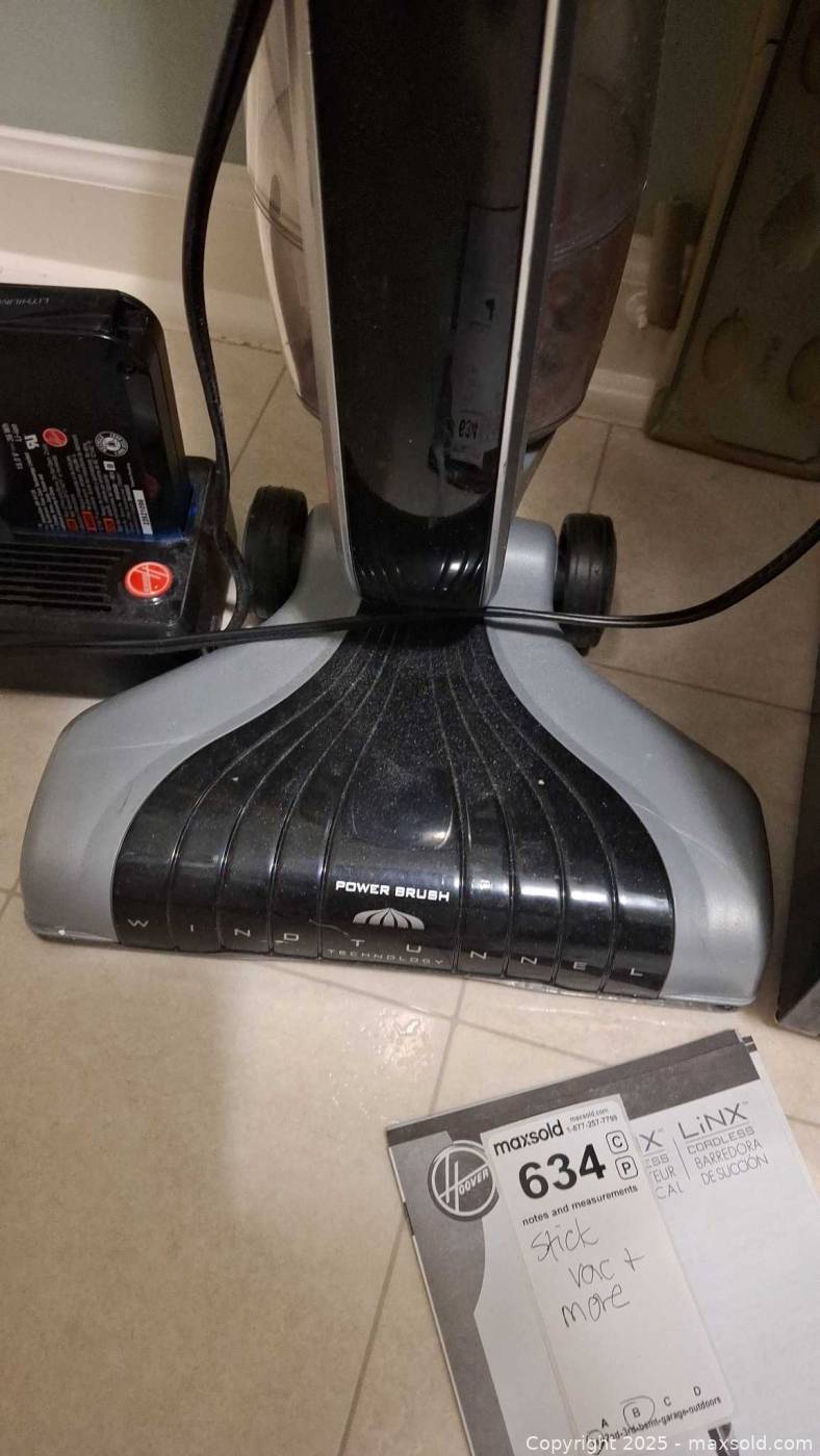 Hoover Stick Vacuum with Charger and Cleaning Accessories | Maxsold
