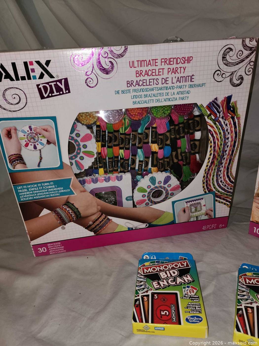 Alex DIY bracelet kits and Monopoly card games | Maxsold