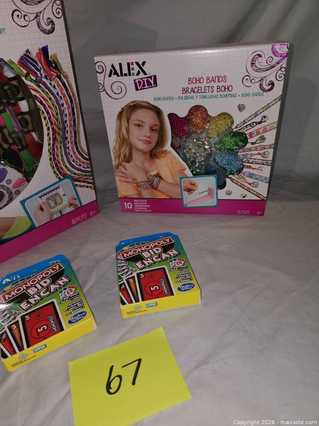 Alex DIY bracelet kits and Monopoly card games | Maxsold