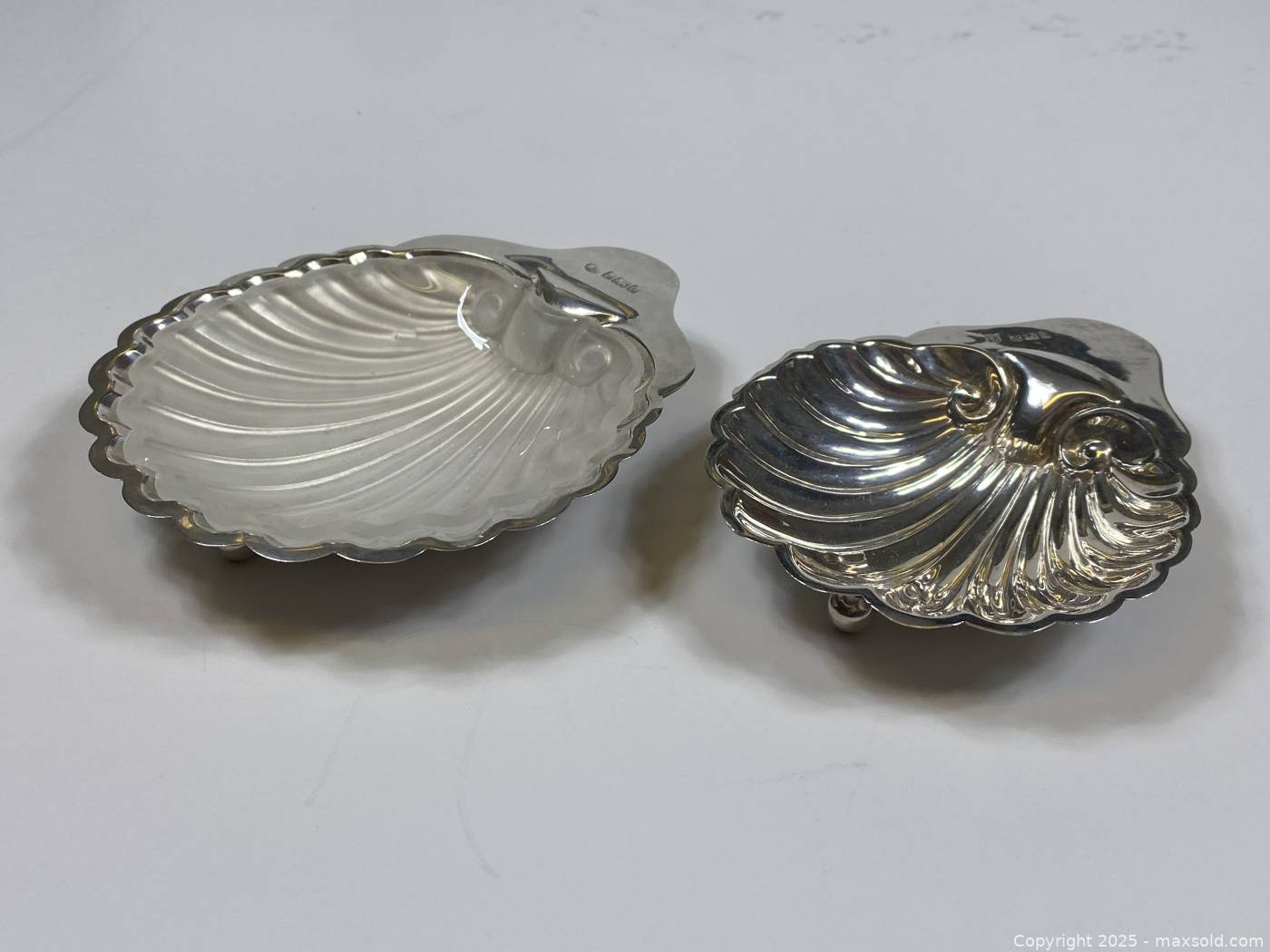 Sterling silver shell-form dishes, two | Maxsold