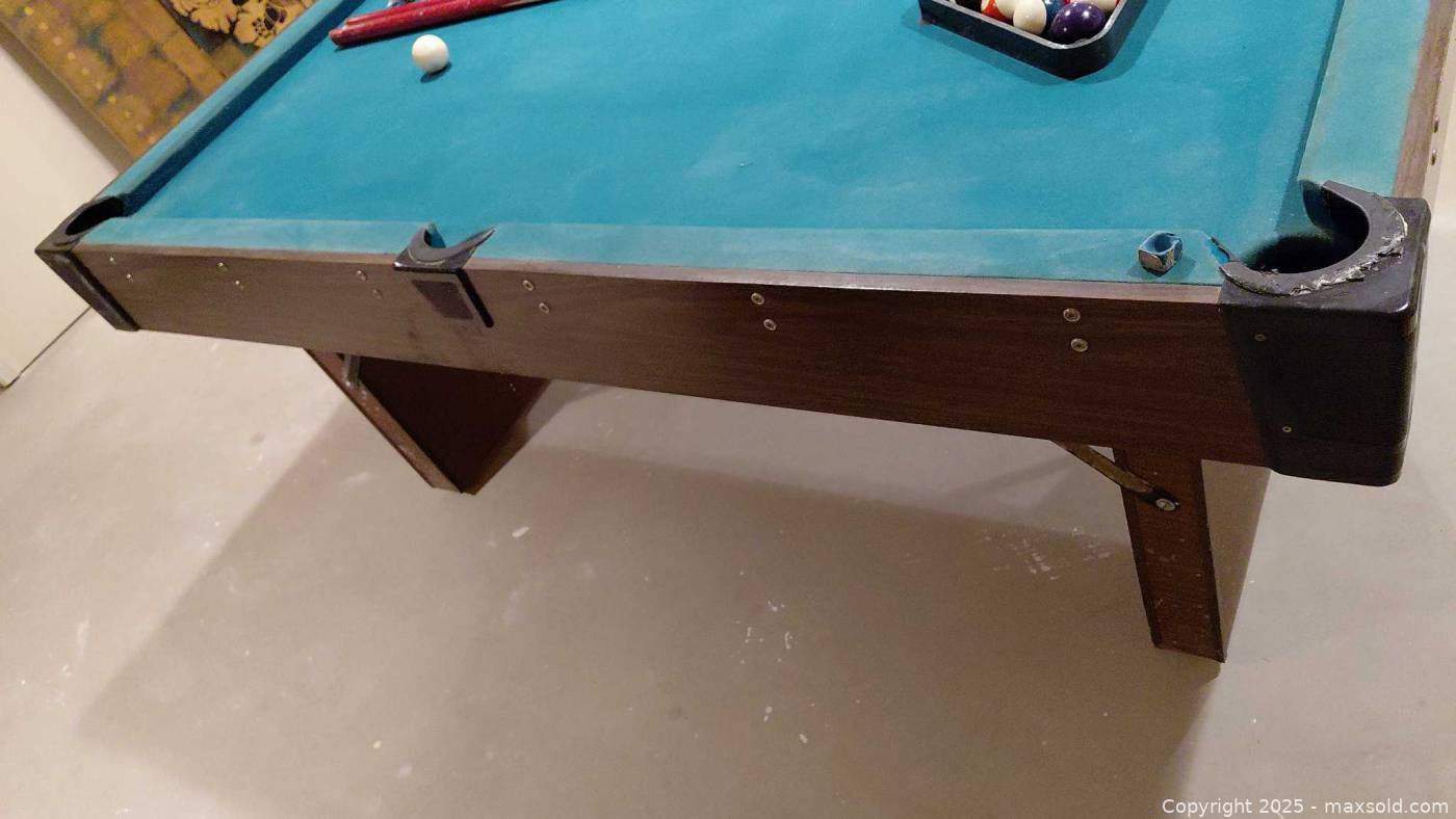 6 ft green felt pool table with accessories | Maxsold