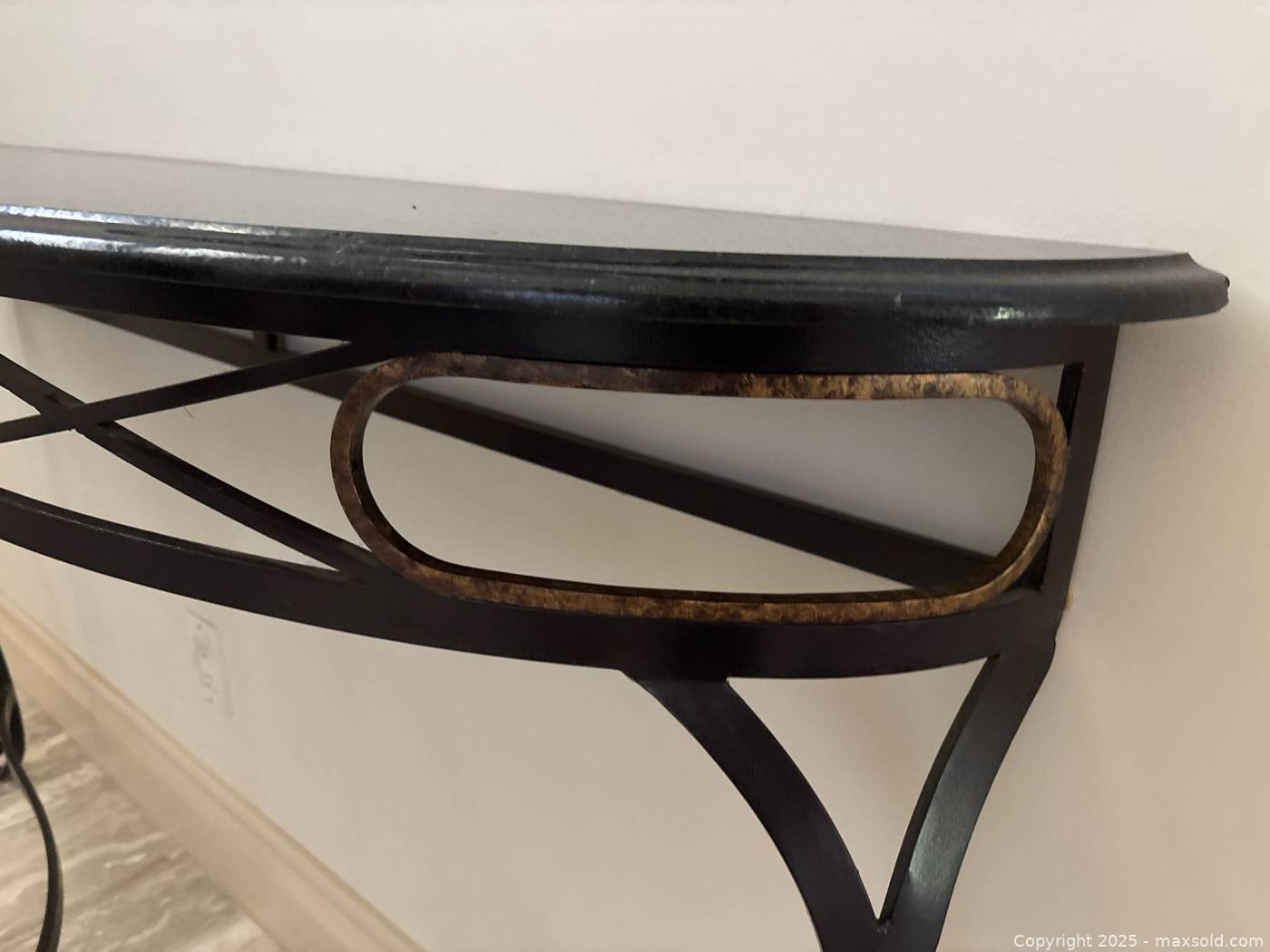 Metal half-moon table with granite top | Maxsold
