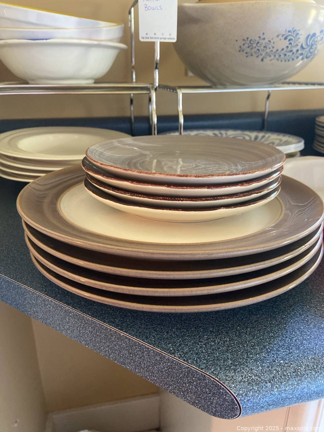 Assorted Plates and Bowls with Metal Cupboard Shelves | Maxsold