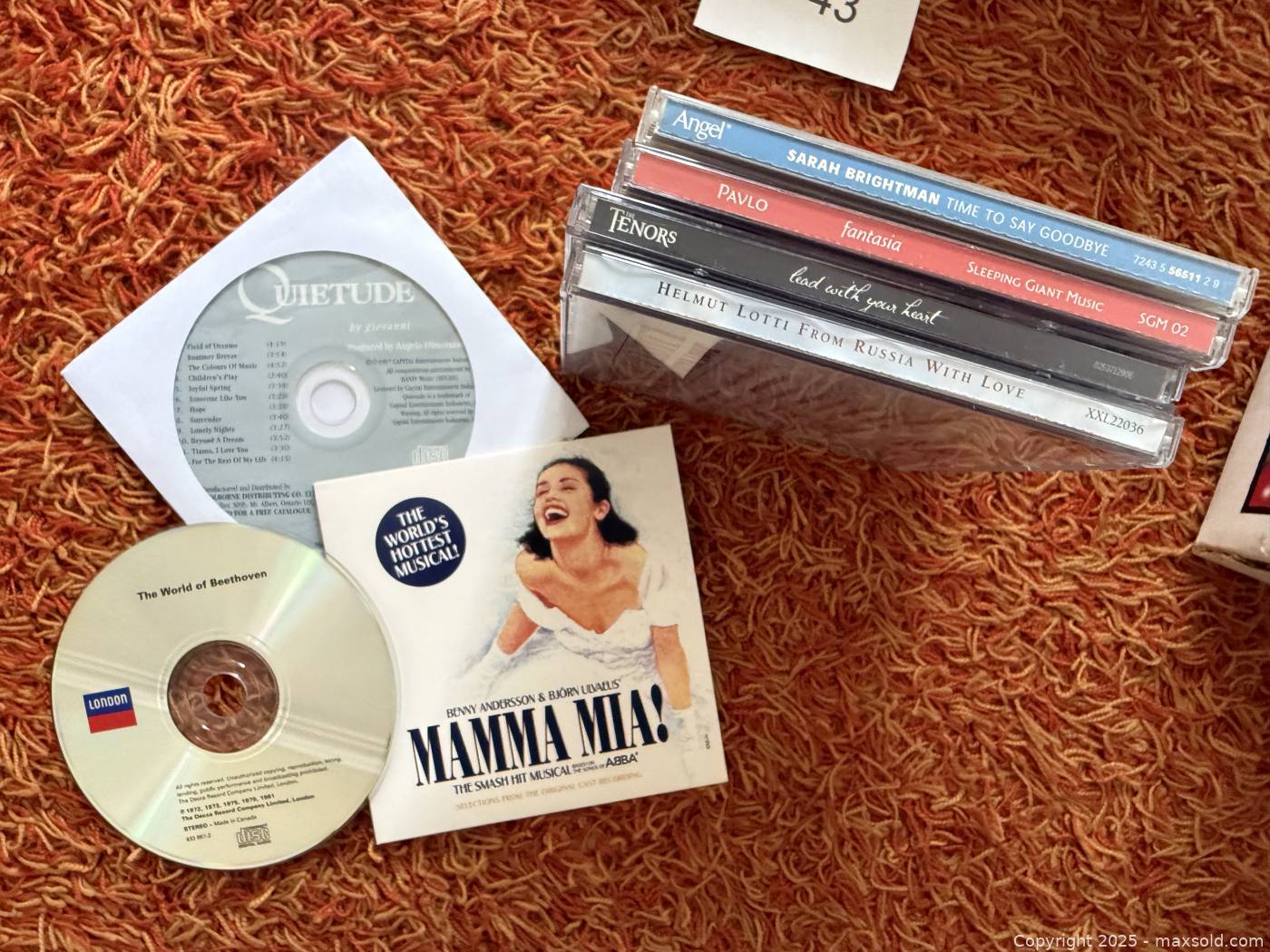 Collection of 99 music CDs and assorted cassettes | Maxsold