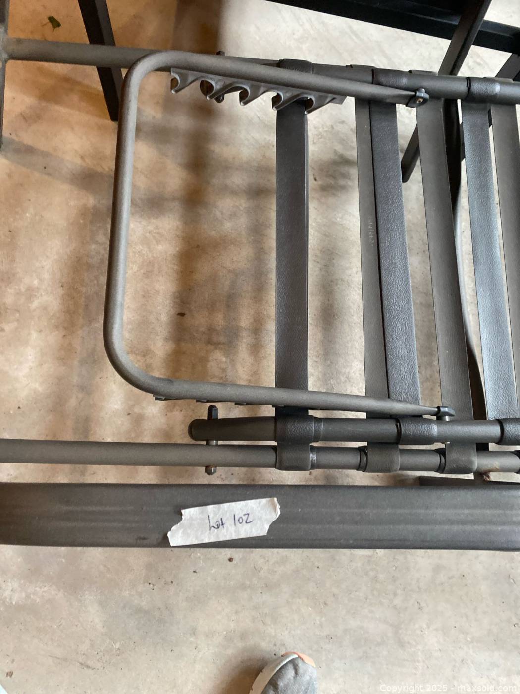 Dark grey aluminum lounge chair frame | Maxsold