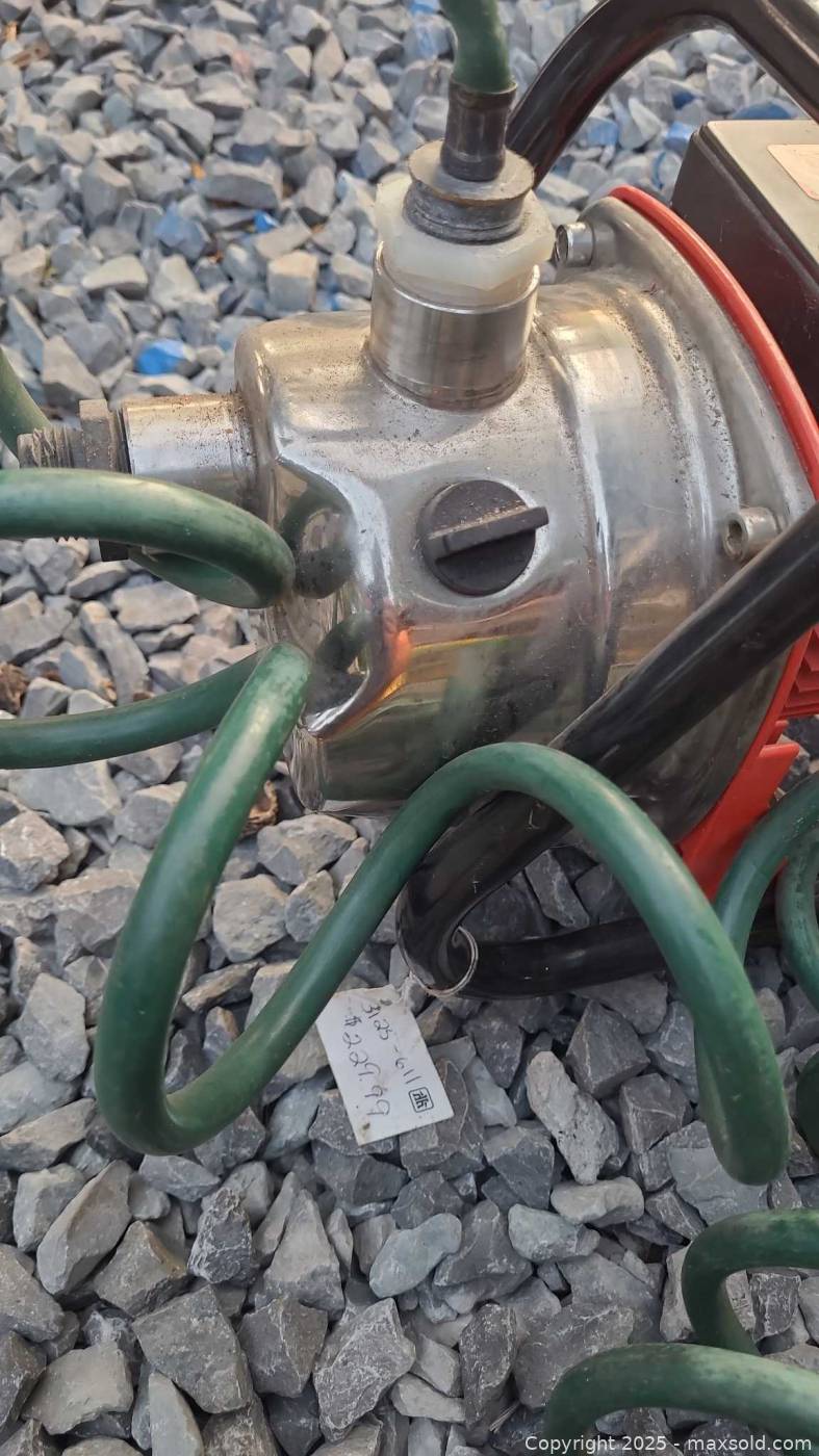 Red Lion electric water pump with hose | Maxsold