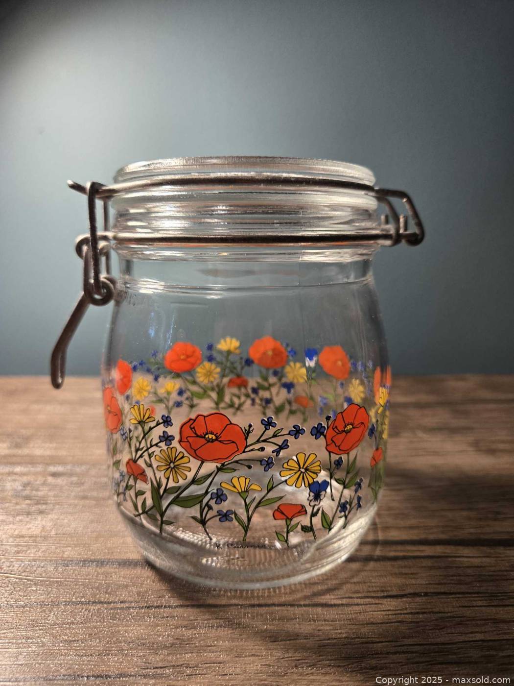 Vintage Glass Swing Top Jar with Wildflower Design | Maxsold
