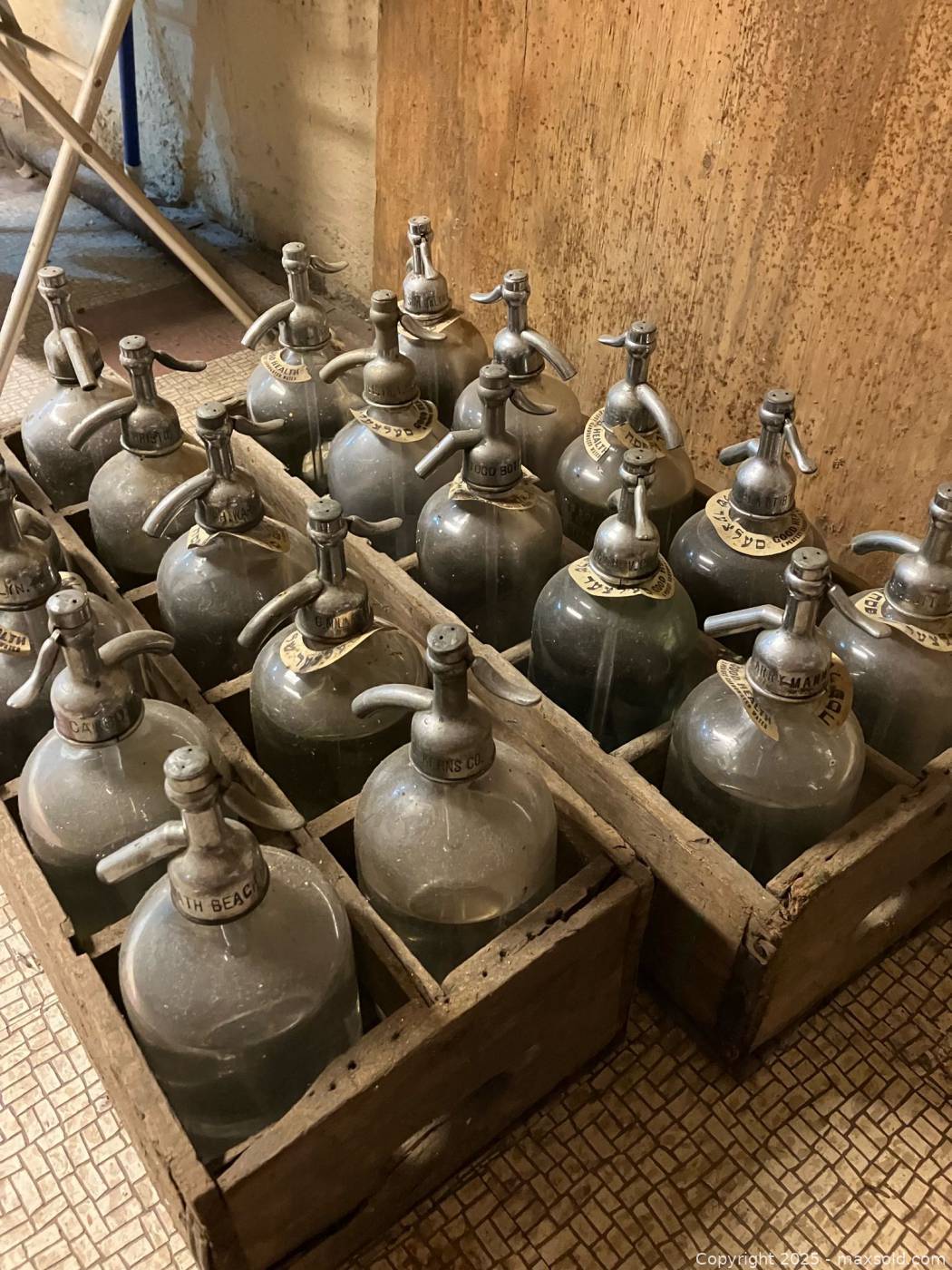 10 vintage glass seltzer bottles with crate | Maxsold