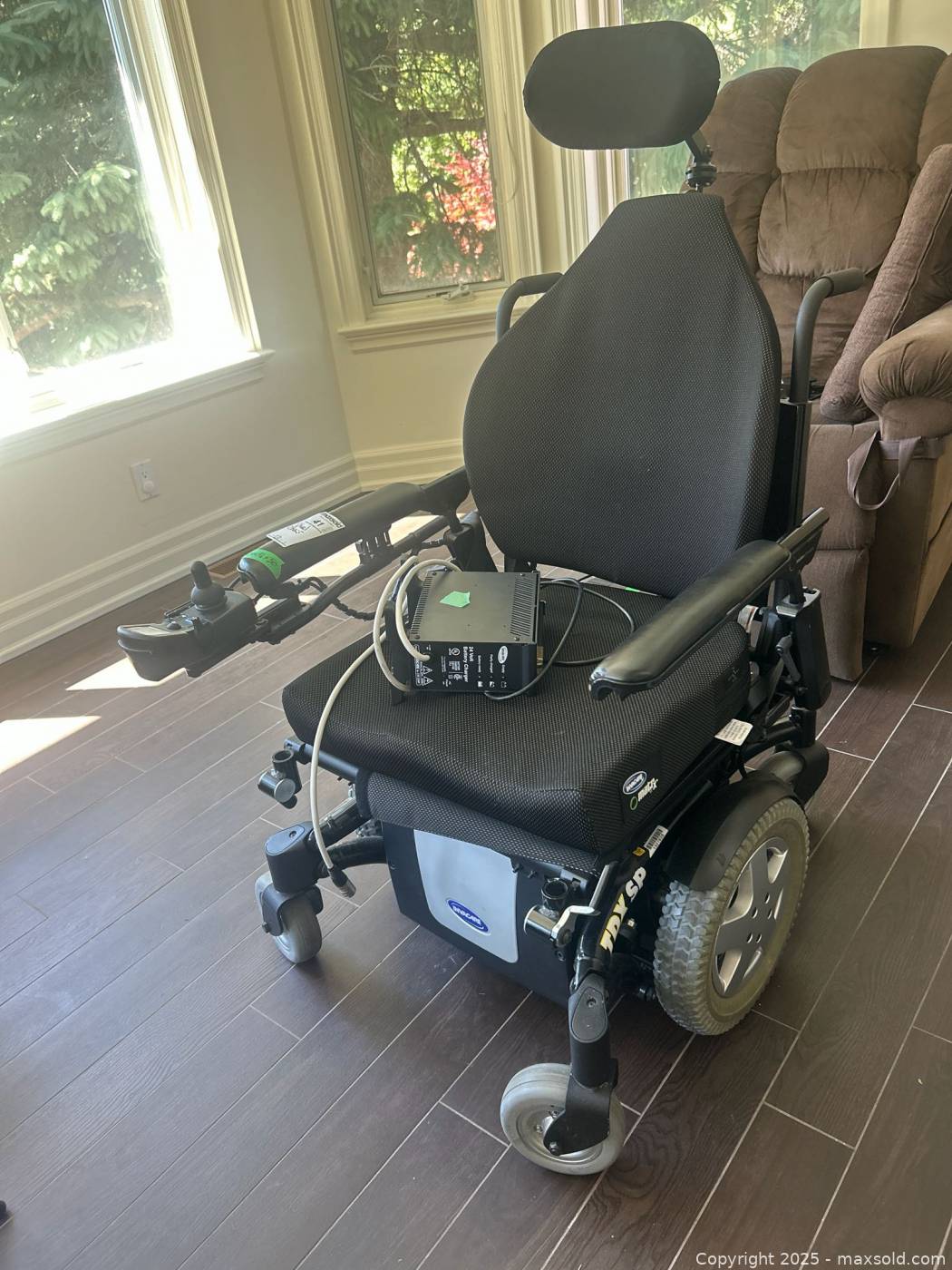 Invacare TDX SP electric wheelchair with charger | Maxsold
