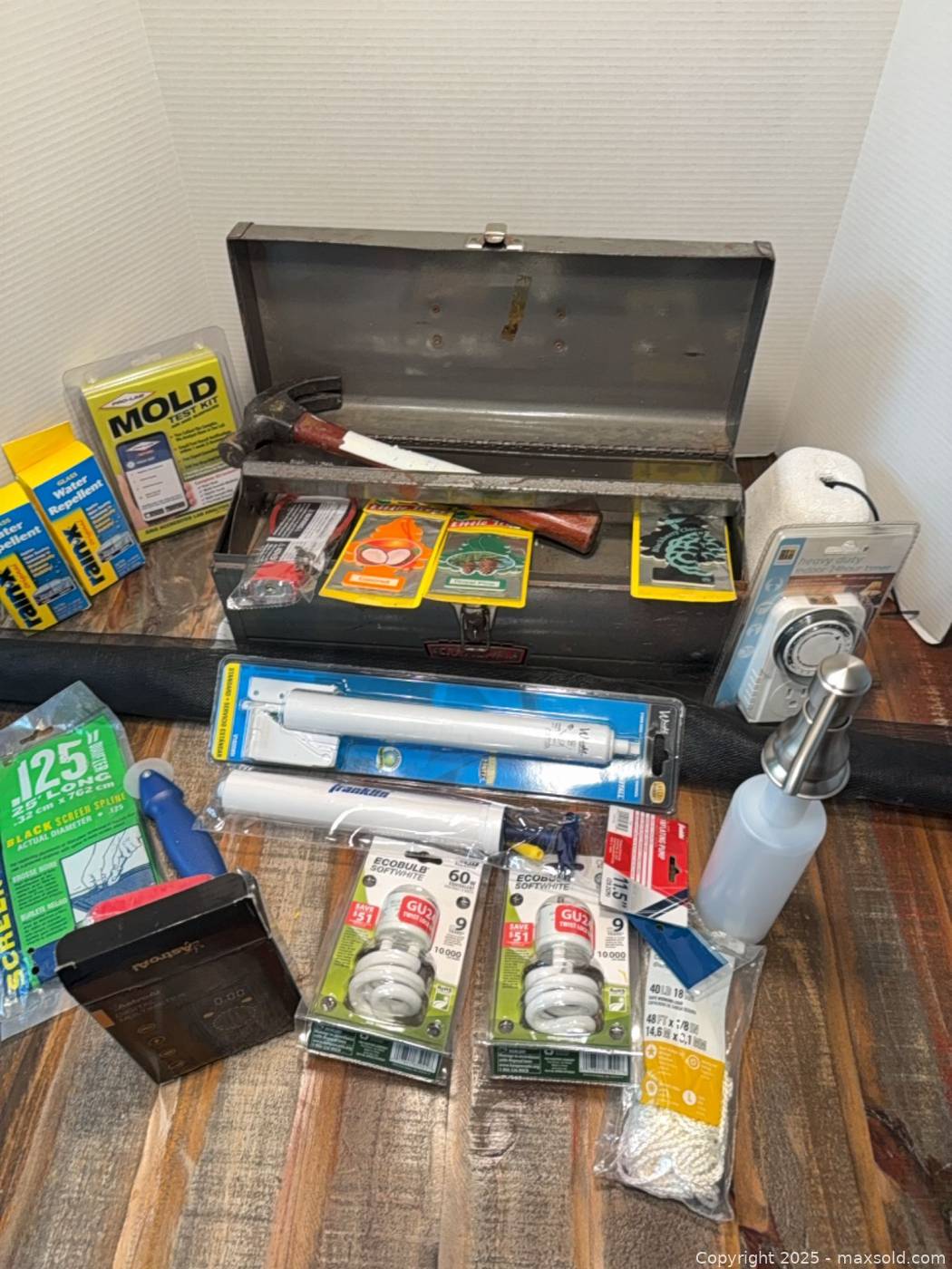 Craftsman metal toolbox with hammer, multimeter, screen repair supplies ...