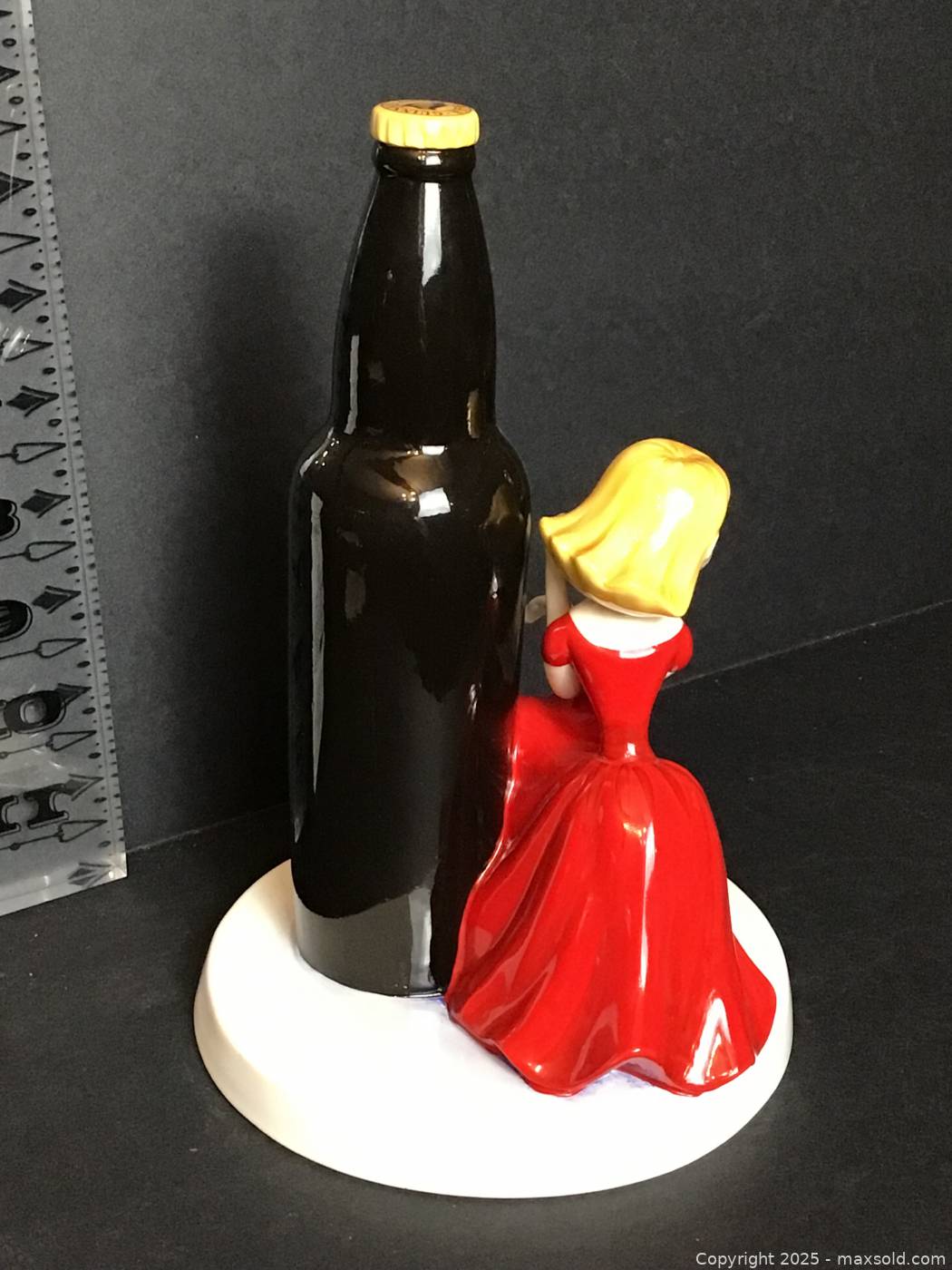 Royal Doulton Guinness Harpist figurine | Maxsold