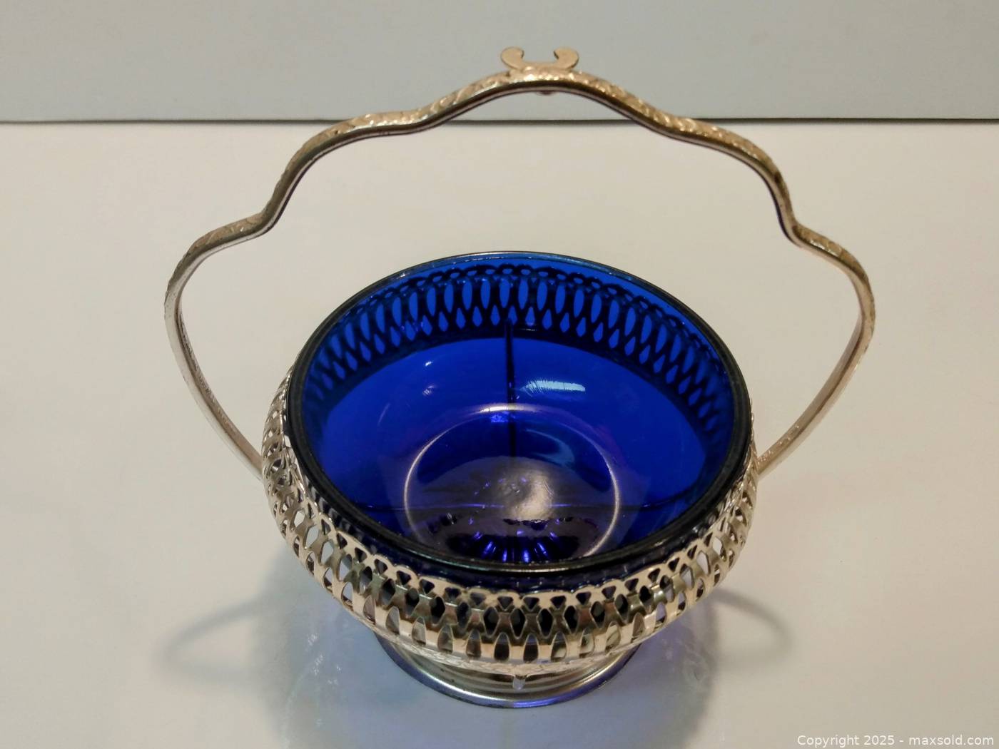 Cobalt blue glass liner in Mayell silver-plated basket | Maxsold
