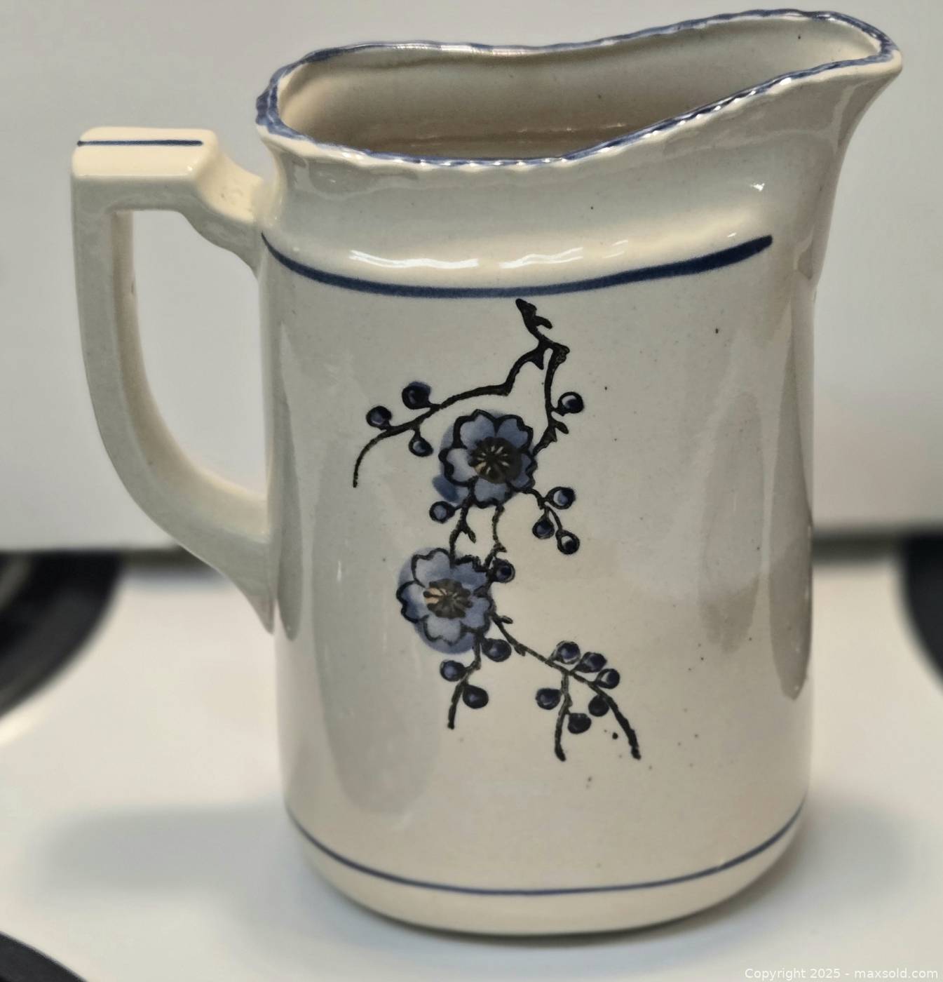 Japanese stoneware pitcher with blue floral | Maxsold