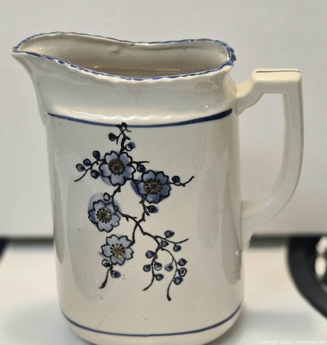 Japanese stoneware pitcher with blue floral | Maxsold