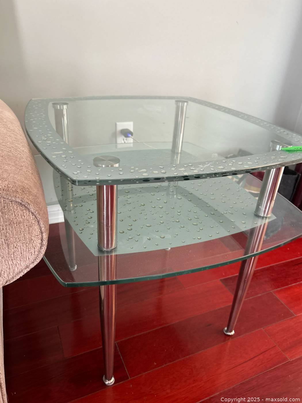 Two-tier glass and metal side table | Maxsold