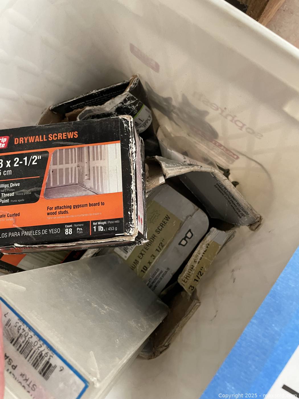 Bucket with assorted drywall screws | Maxsold