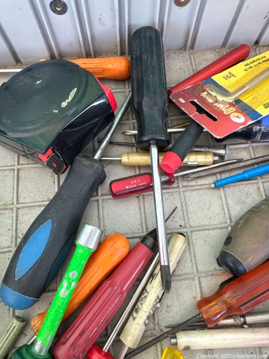 Screwdrivers, tape measure, wire stripper lot | Maxsold