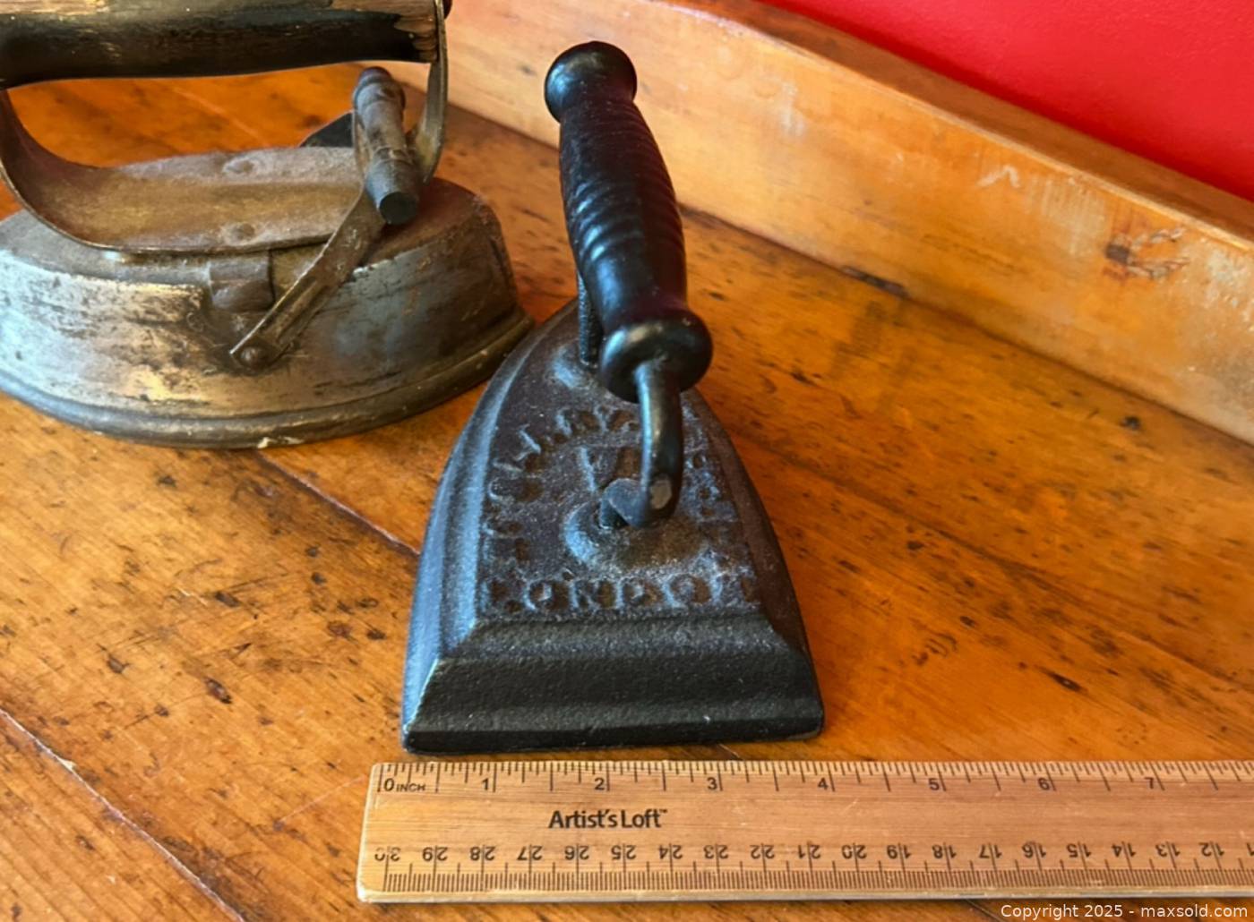 2 antique cast iron sad irons | Maxsold