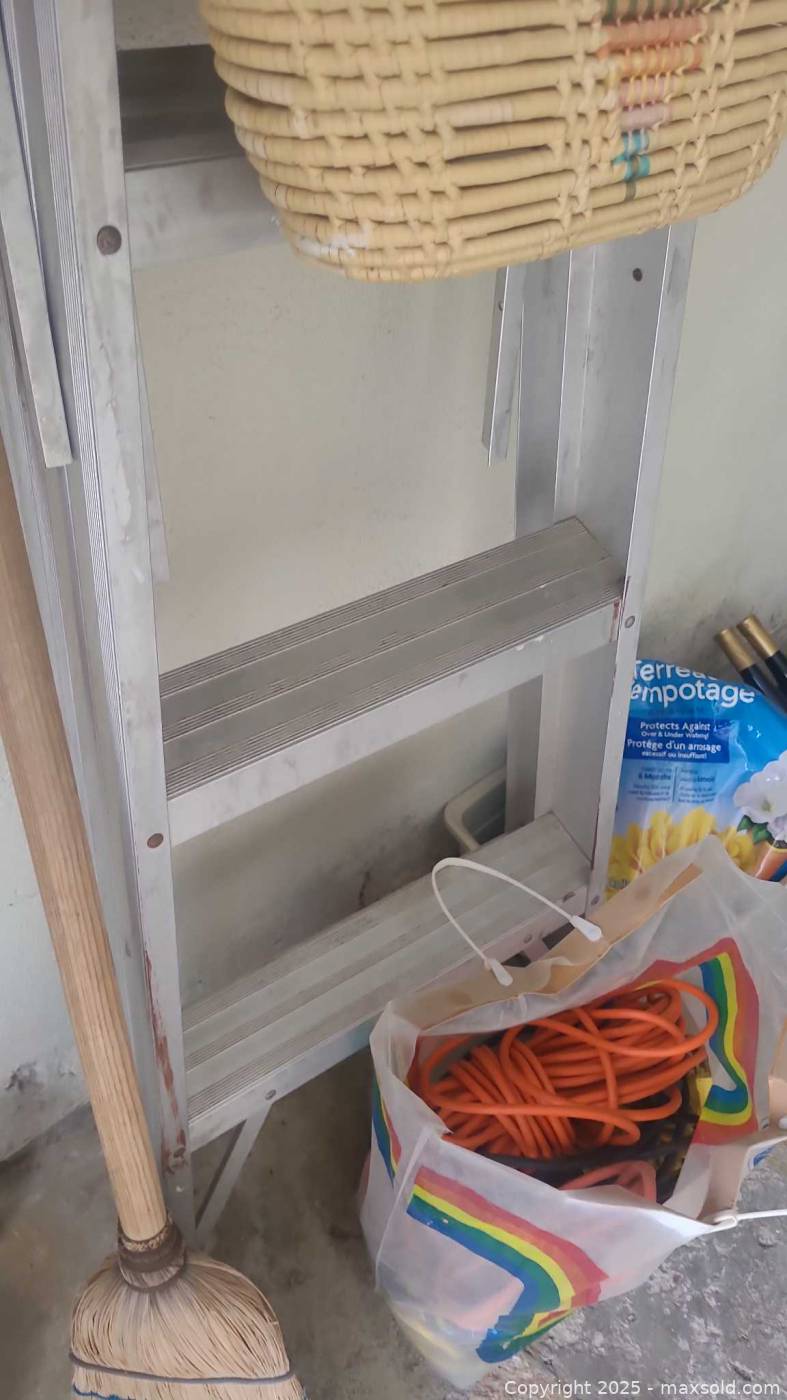 Step ladder, extension cords, broom, baskets, flower food, balsamic ...