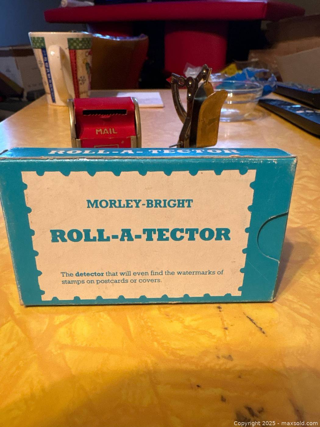 Stamp holder, brass postal scale, Morley-Bright Roll-A-Tector with box ...