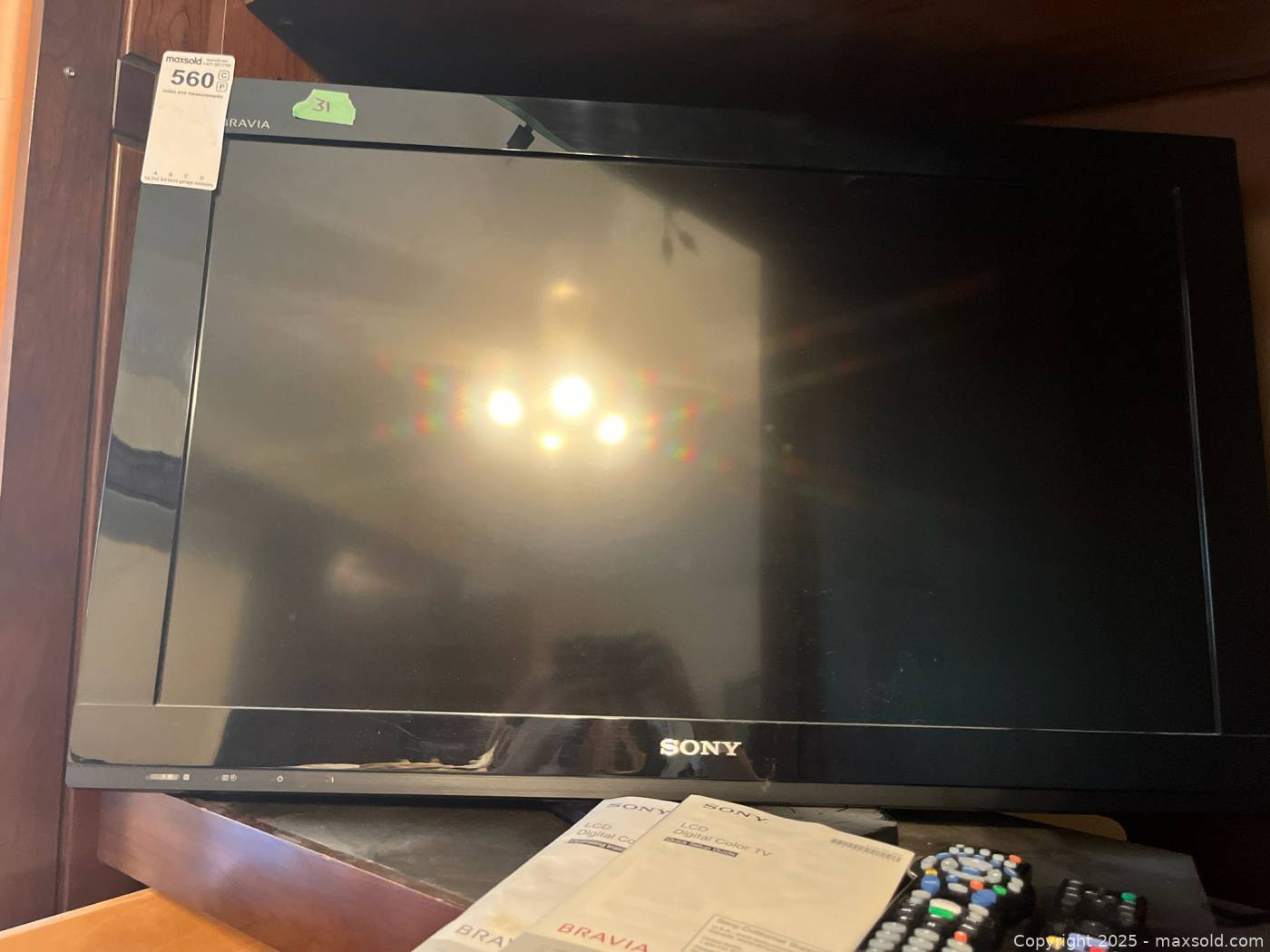 Sony Bravia 31" LCD television with remotes | Maxsold