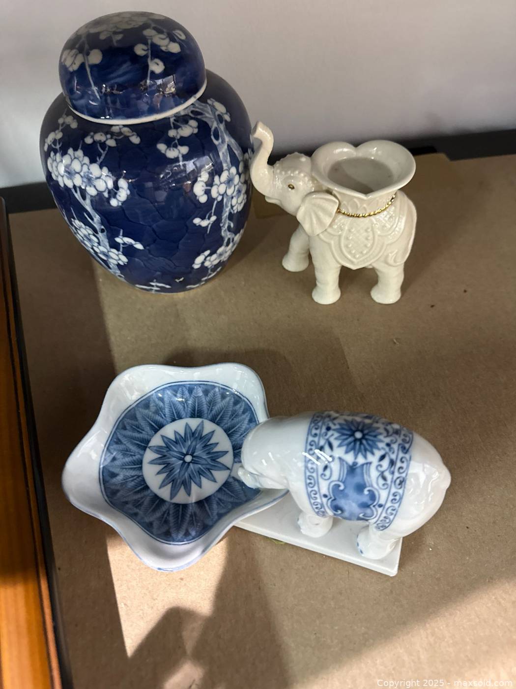 Shadow box with miniature blue-white porcelain, lidded ginger jar, two ...