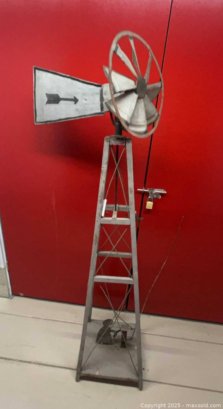 Handmade metal and wood folk art windmill model | Maxsold
