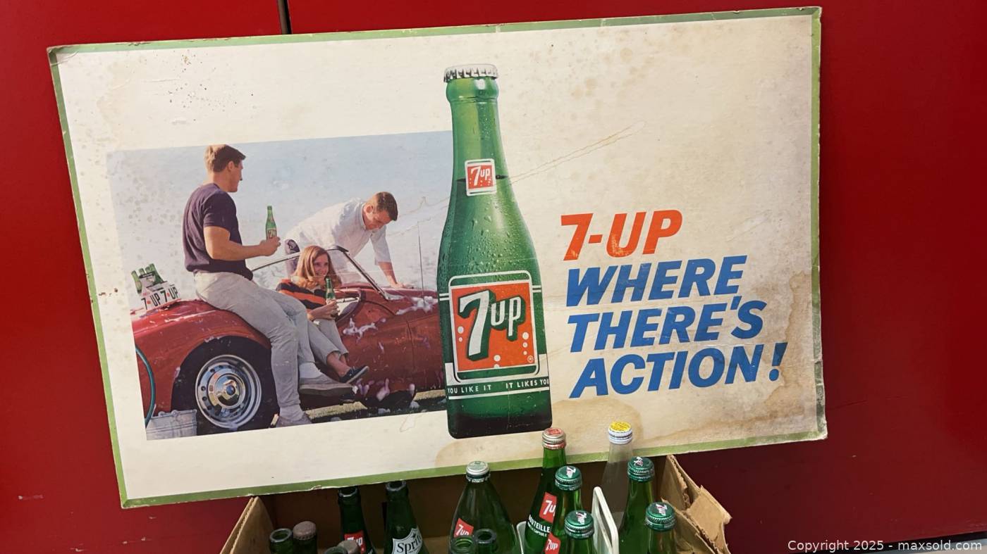 1960s 7-Up sign with 21 soda bottles | Maxsold