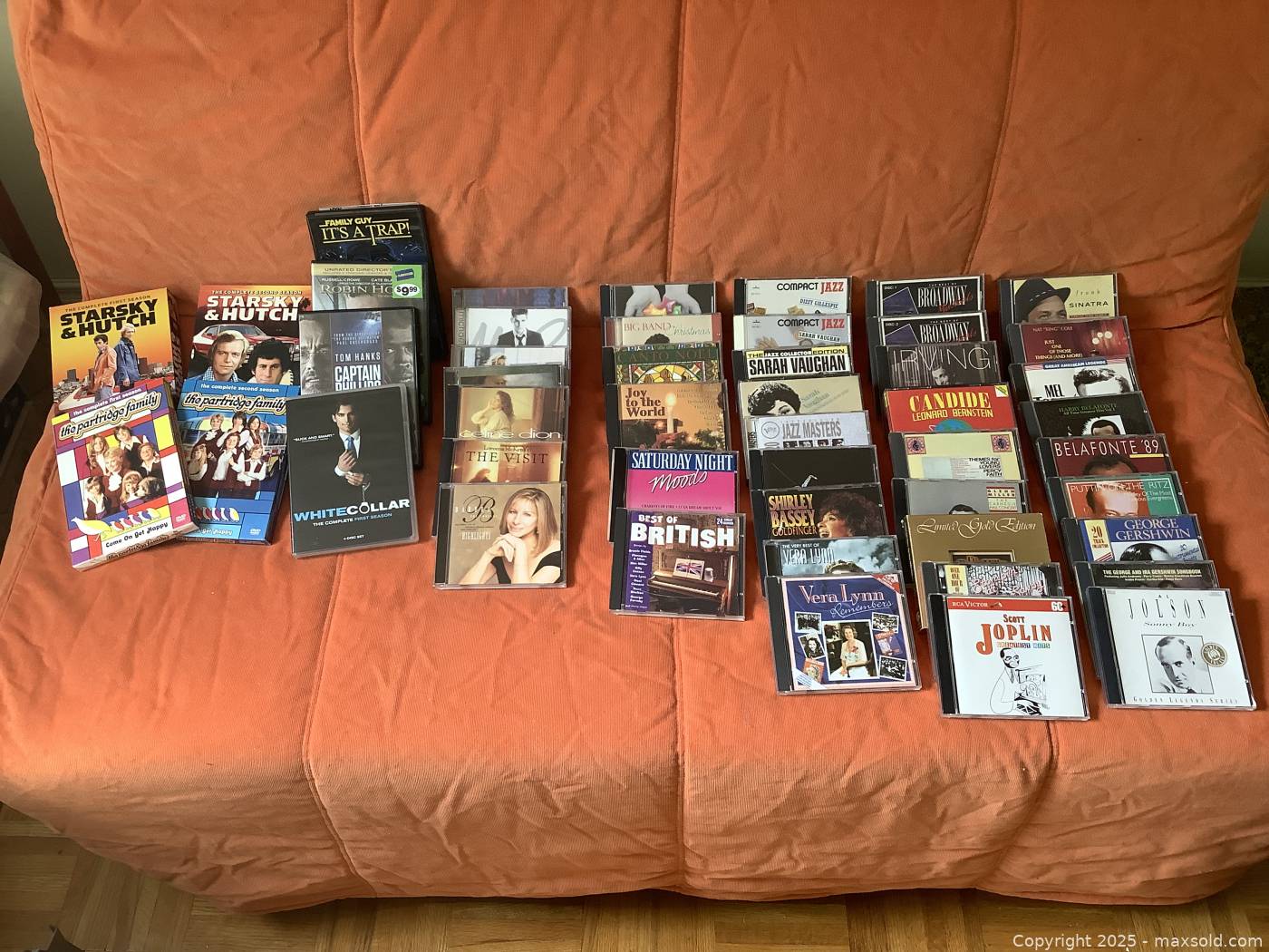 Assorted DVD box sets, single DVDs and CD collection | Maxsold