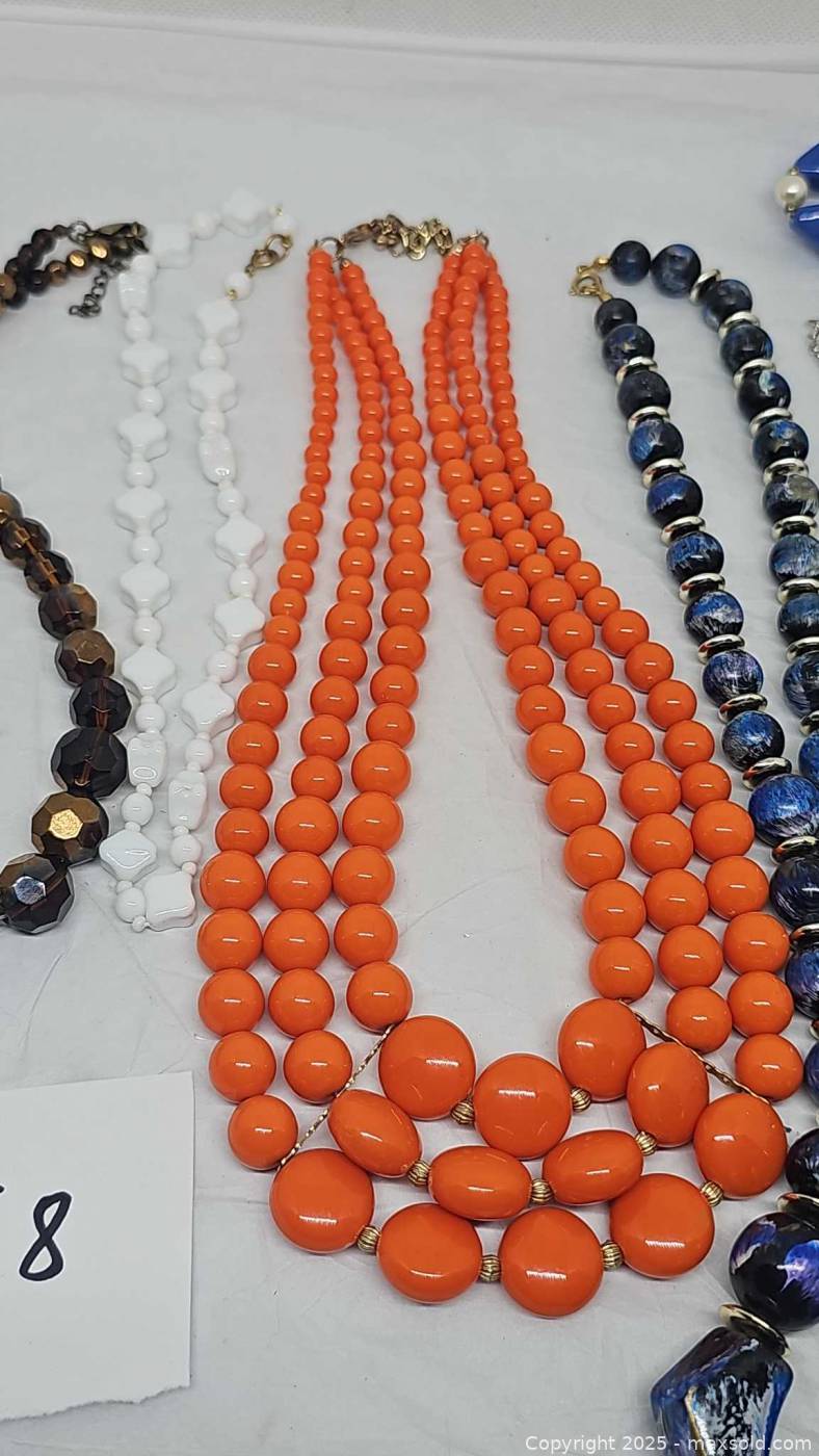 Seven vintage beaded necklaces | Maxsold