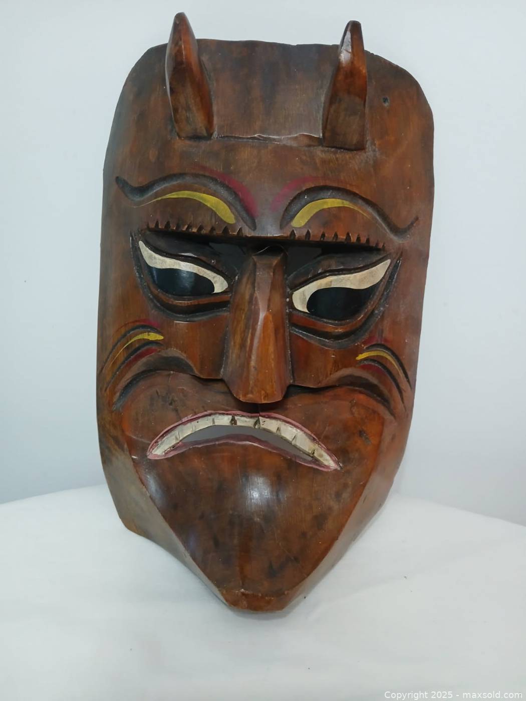Hand-Carved Wooden Horn Mask | Maxsold