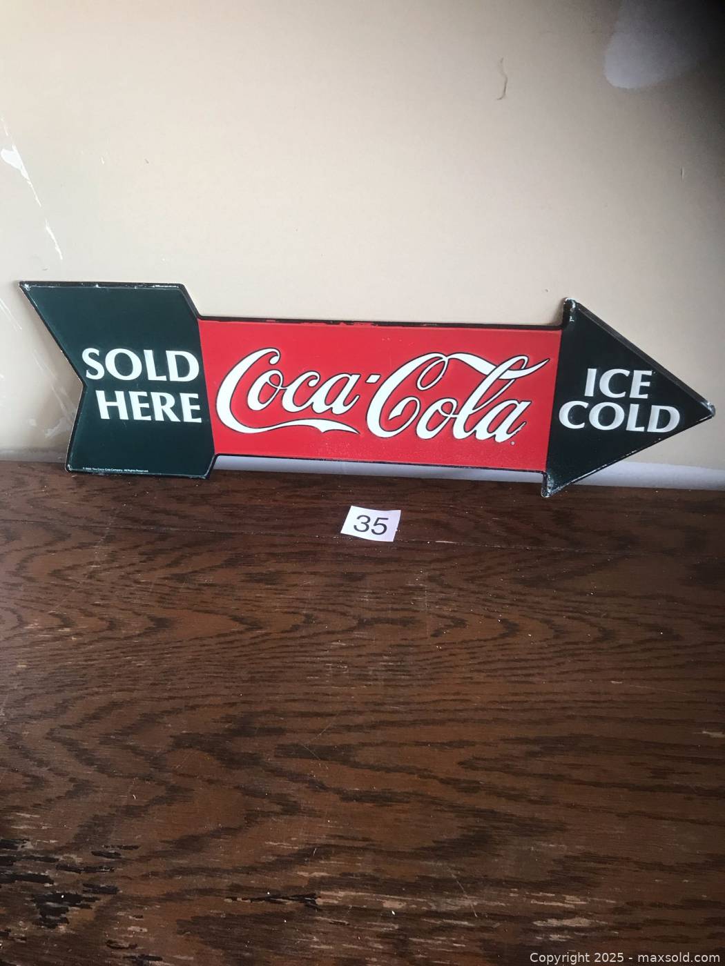 Coca-Cola arrow tin sign 26.5" | Maxsold