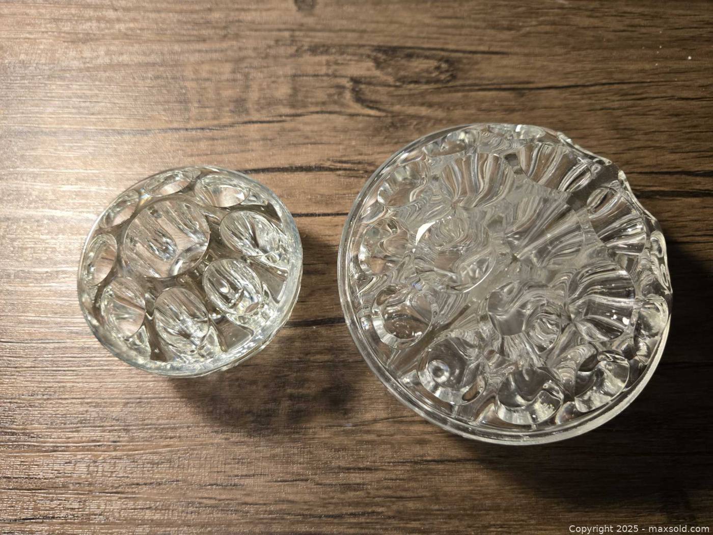 Pair of vintage clear glass flower frogs | Maxsold