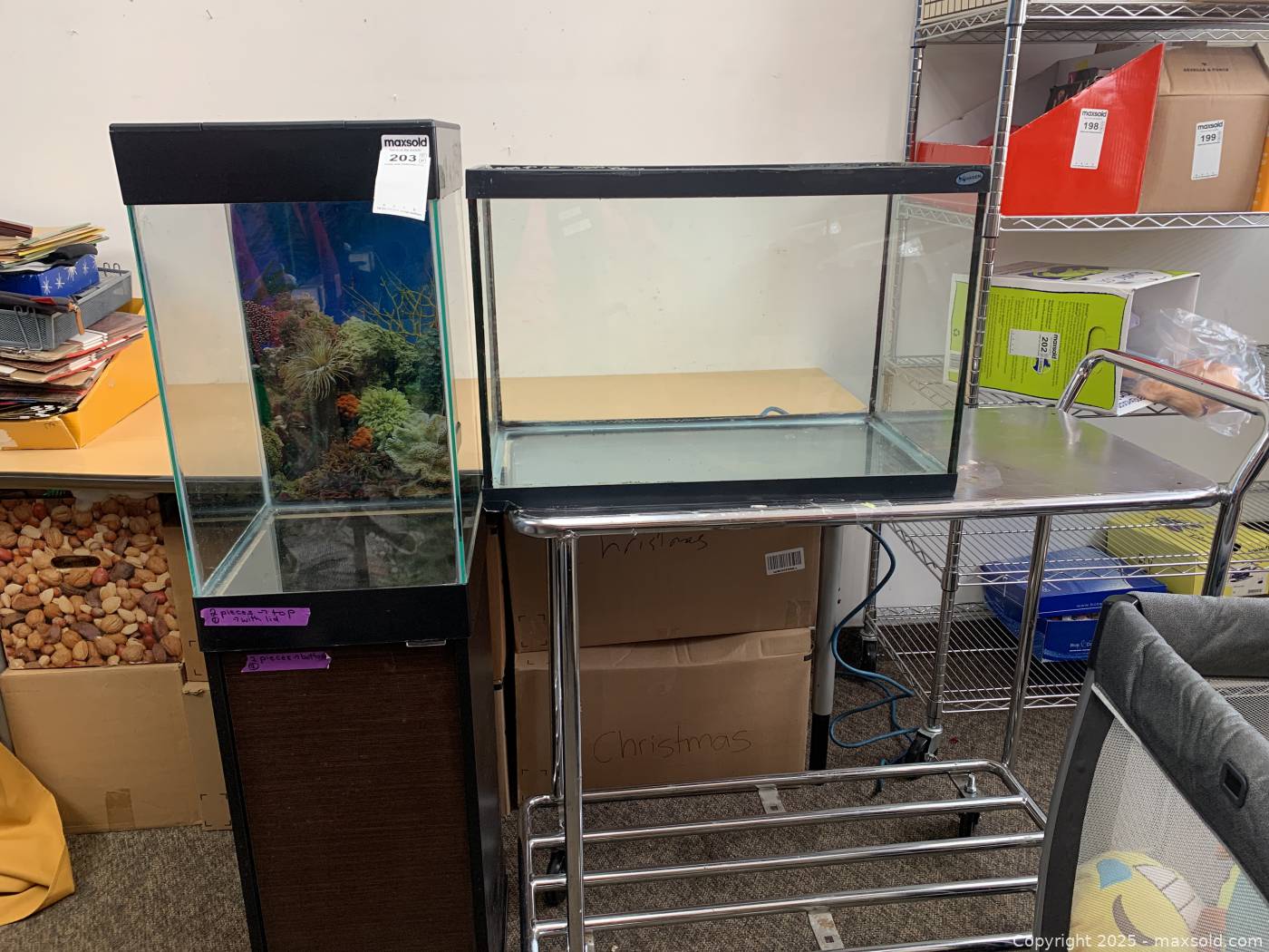 Two glass aquarium fish tanks with stand | Maxsold
