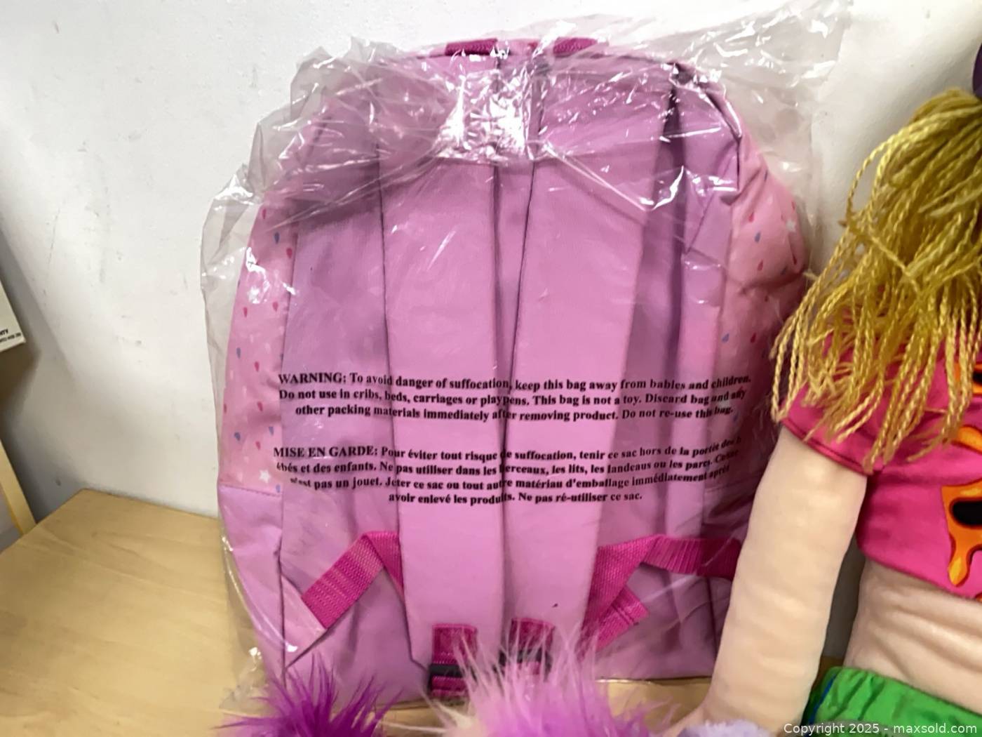 Rag doll, Impact backpack, plush toys, shoes, book, tumbler | Maxsold