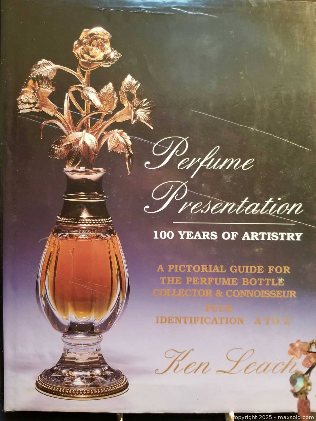 Perfume Presentation reference books and vintage pink ribbed perfume ...